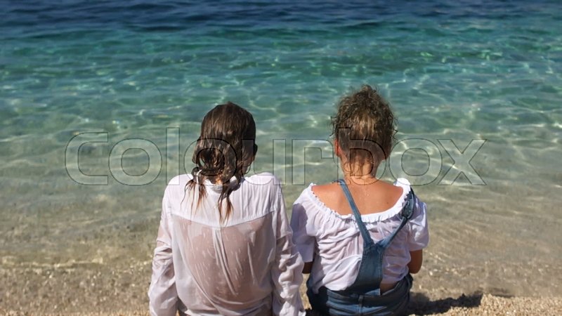 Pupils on vacation, rest in the Balkans. Pure sea water, two happy ...
