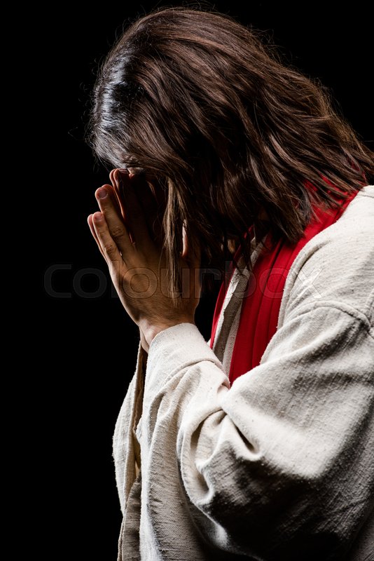 Man covering face while praying ... | Stock image | Colourbox