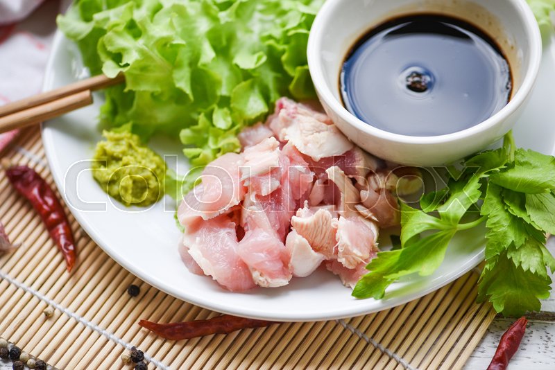 Sashimi raw chicken on white plate with ... | Stock image | Colourbox