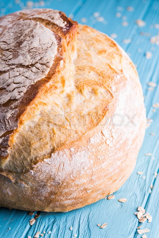 Big loaf of bread on a wooden table | Stock image | Colourbox