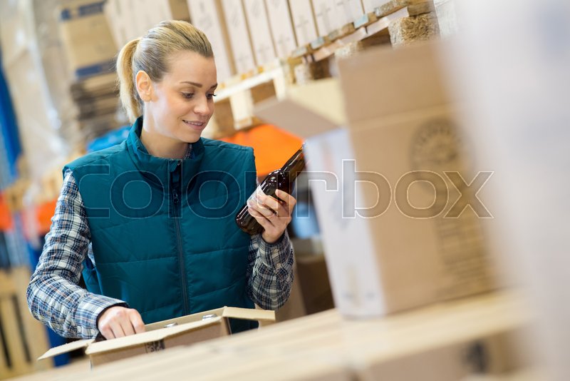 Factory packaging worker | Stock image | Colourbox