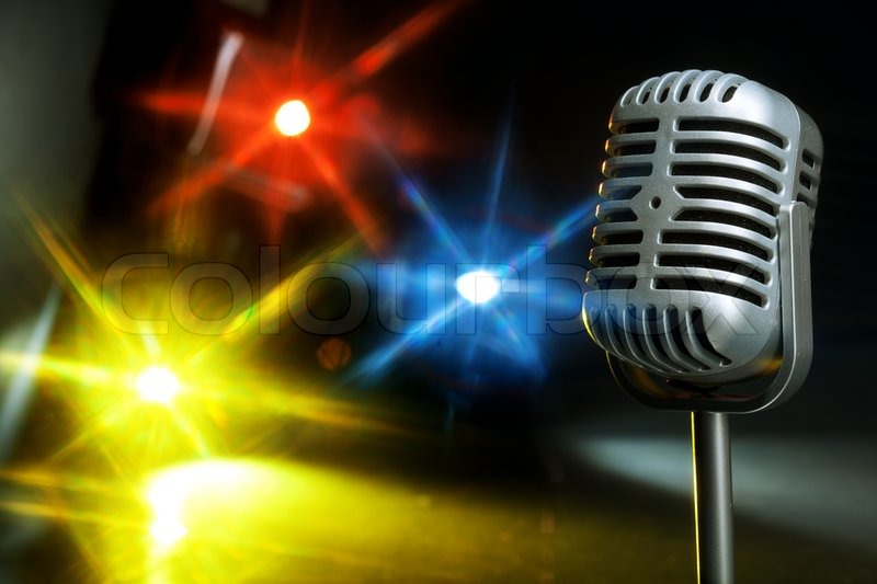 Retro microphone with spotlight | Stock Photo | Colourbox
