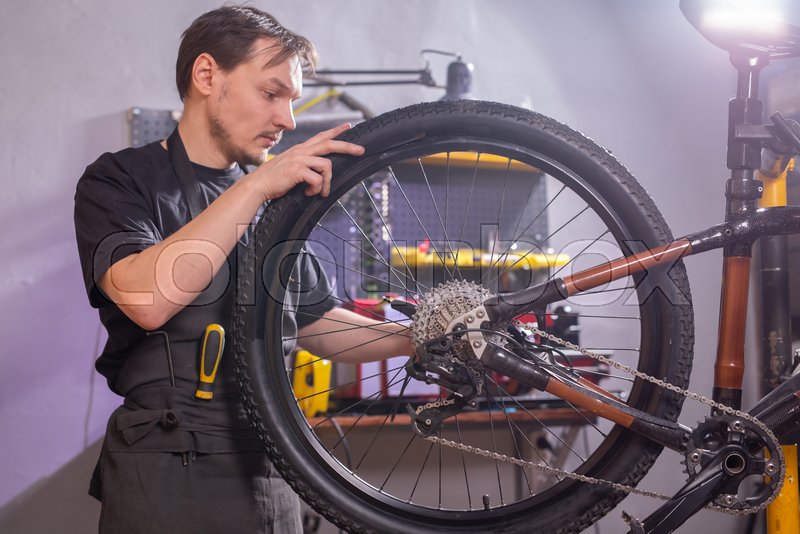 Service, repair, bike and people ... | Stock image | Colourbox