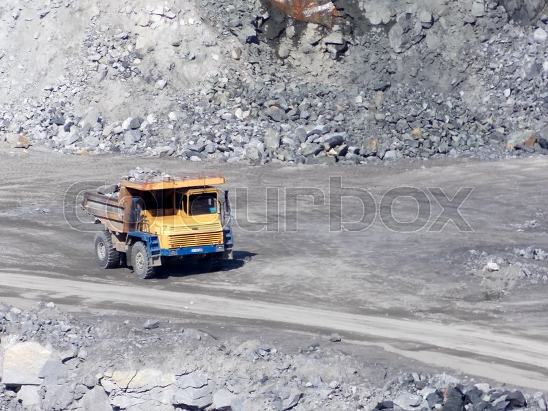 The car in the quarry carries crushed ... | Stock image | Colourbox