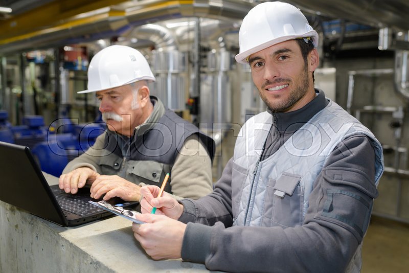 Engineer and foreman in factory | Stock image | Colourbox