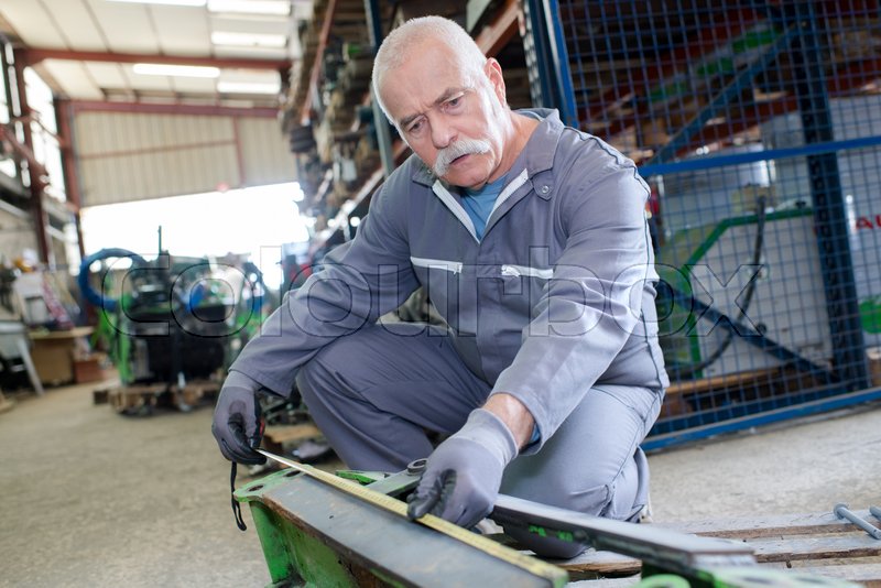 Portrait of senior factory worker | Stock image | Colourbox