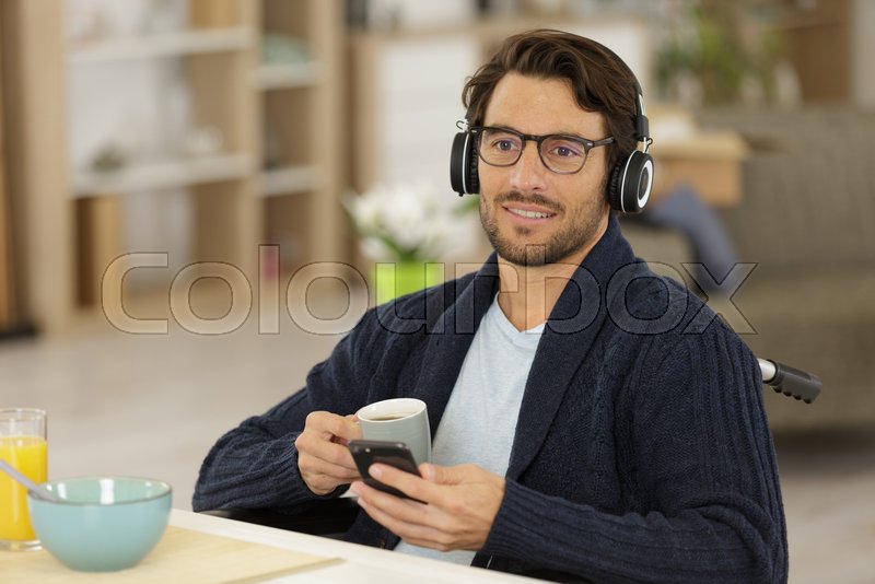 Relaxed handsome man drinking coffee | Stock image | Colourbox