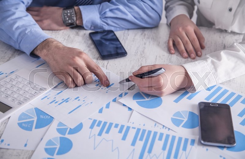 Business people working in financial ... | Stock image | Colourbox