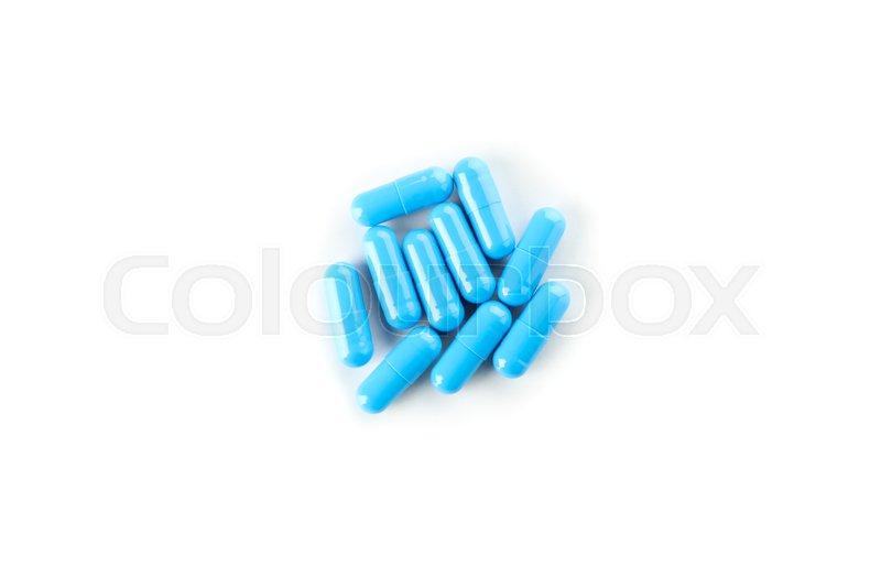 Blue capsules pill isolated on white ... | Stock image | Colourbox