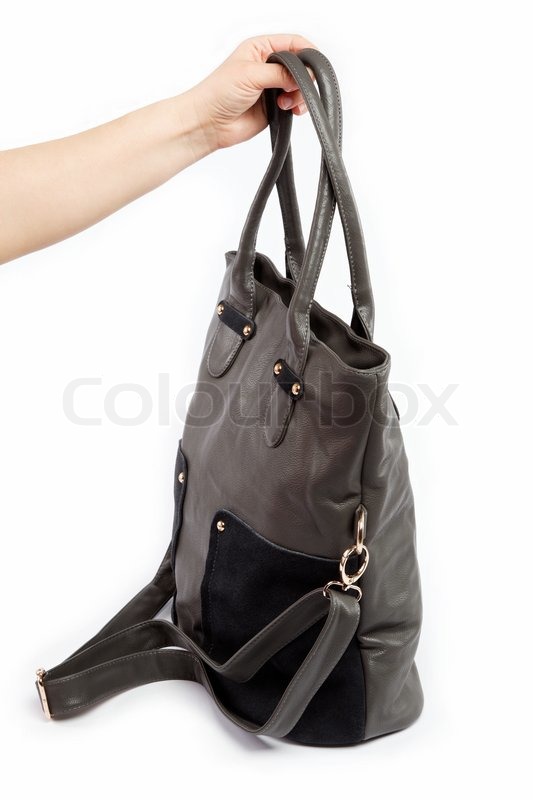Beautiful female hand holding a bag ... | Stock image | Colourbox