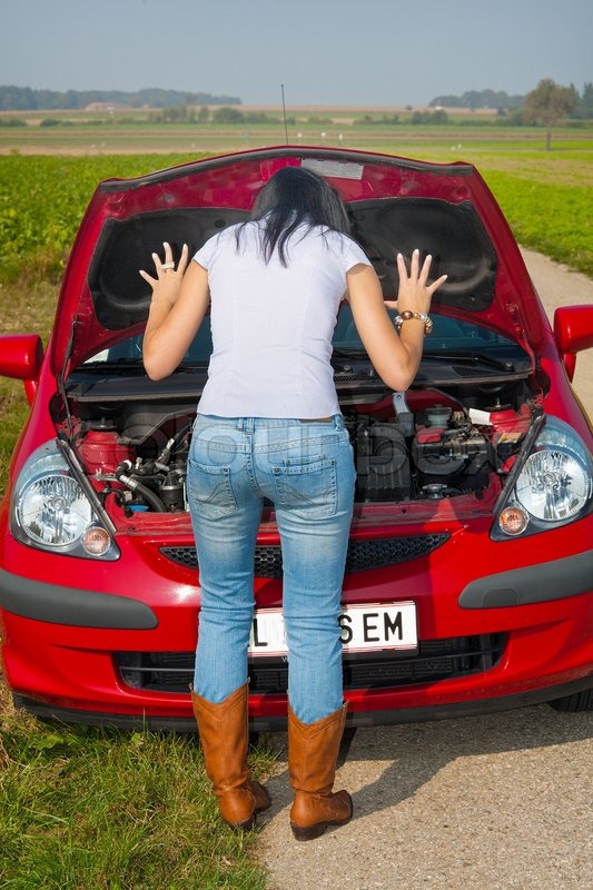Woman in her car broke down engine ... | Stock image | Colourbox