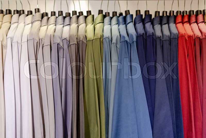 Close up of Multi colored shirts on ... | Stock image | Colourbox