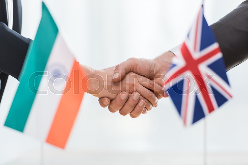 Cropped view of diplomats shaking hands ... | Stock image | Colourbox