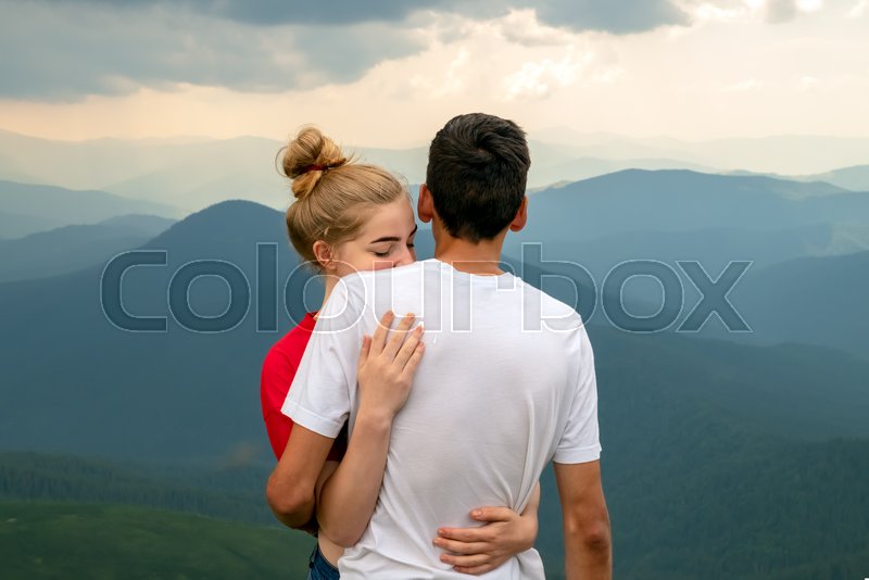 Loving girl is sad while saying goodbye ... | Stock image | Colourbox