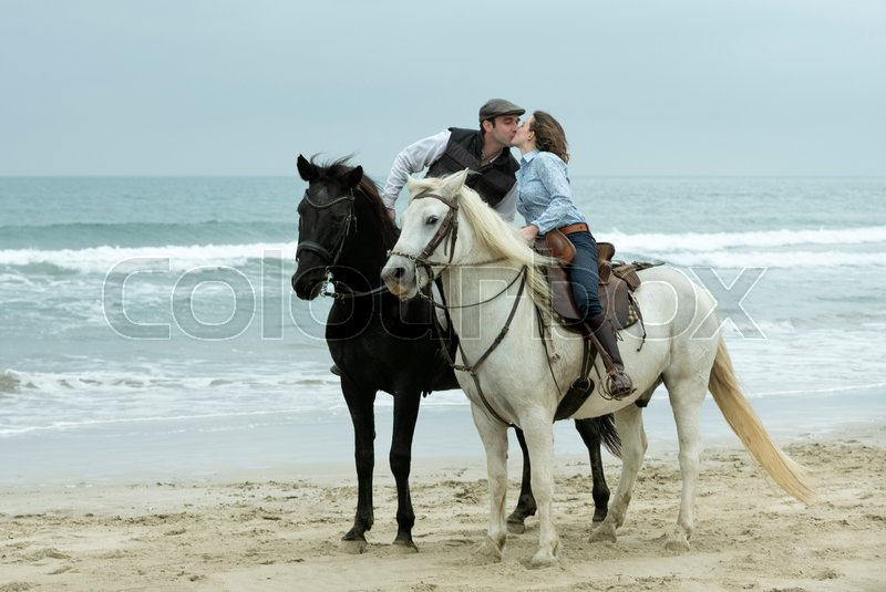 Two riders are training their horses on ... | Stock image | Colourbox