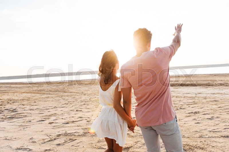 Back view of a beautiful young couple ... | Stock image | Colourbox