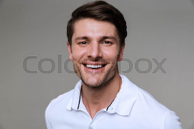 Image of a happy positive handsome ... | Stock image | Colourbox