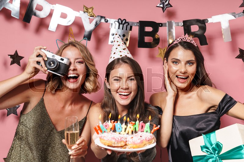 Image of happy party girls with retro ... | Stock image | Colourbox