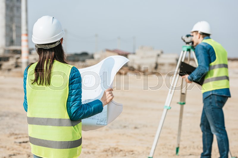 Selective focus of surveyor with ... | Stock image | Colourbox