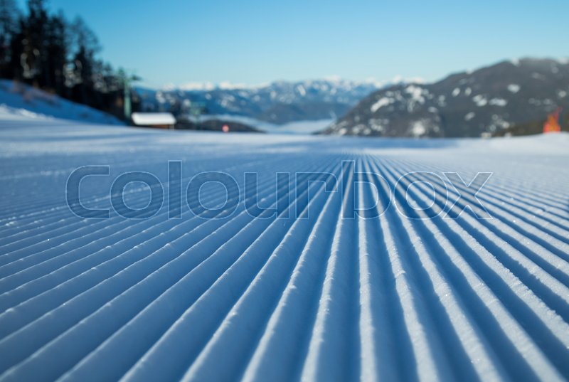 Fresh snow on ski slope, winter ... | Stock image | Colourbox