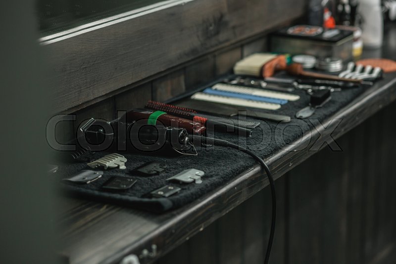 Close up of barber machine brushes and ... | Stock image | Colourbox