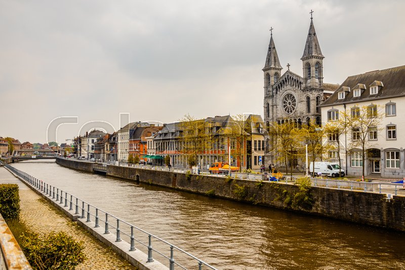 Escaut river and street with old ... | Stock image | Colourbox
