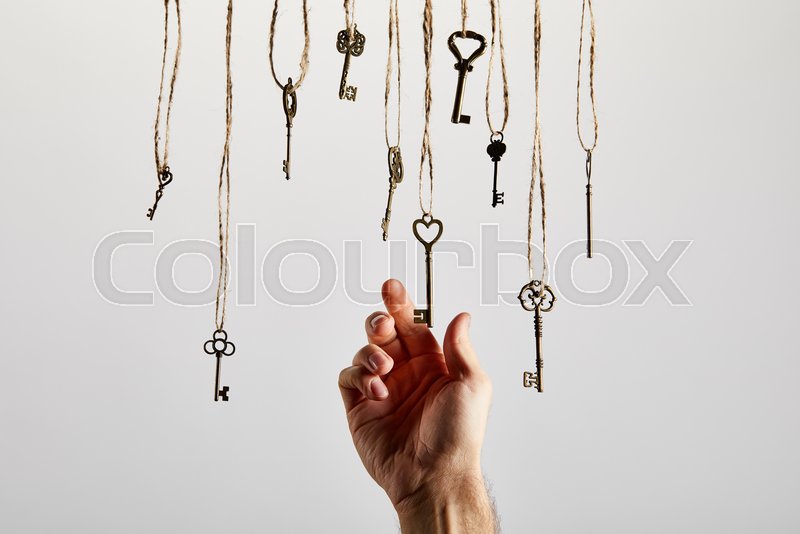 Top view of vintage rusty keys on white ... | Stock image | Colourbox