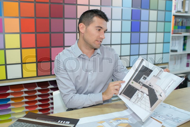 Designer working with color palette ... | Stock image | Colourbox