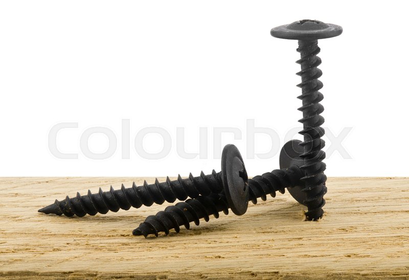 Screws screwed into a wooden Board ... | Stock image | Colourbox