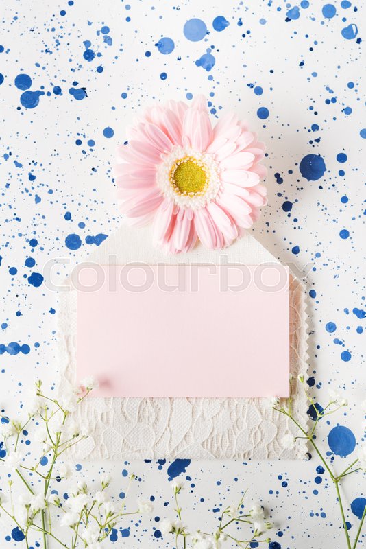 Blank pink card and flowers. Mockup for ... | Stock image | Colourbox