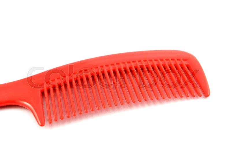 Red comb isolated on white background | Stock image | Colourbox
