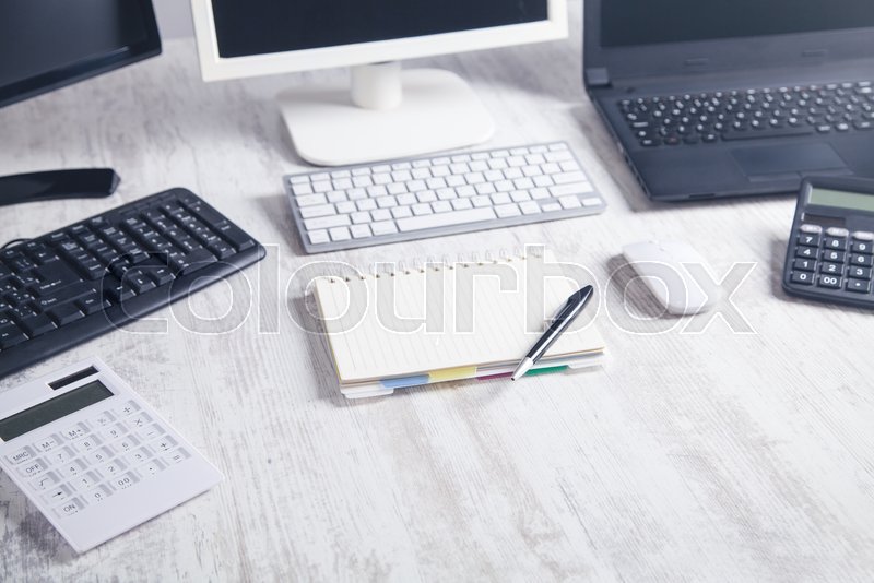 Workspace with computers. Desk work ... | Stock image | Colourbox
