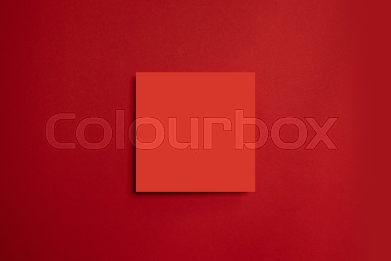 Red paper poster on a red background. ... | Stock image | Colourbox