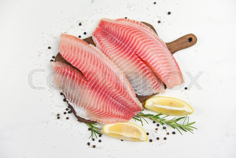 Fresh fish fillet sliced for steak or ... | Stock image | Colourbox