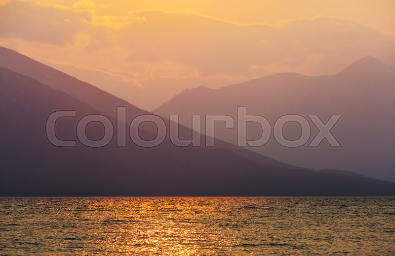 Sunset scene on the lake at sunset | Stock image | Colourbox