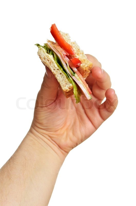 Man's hand holding bitten sandwich ... | Stock image | Colourbox