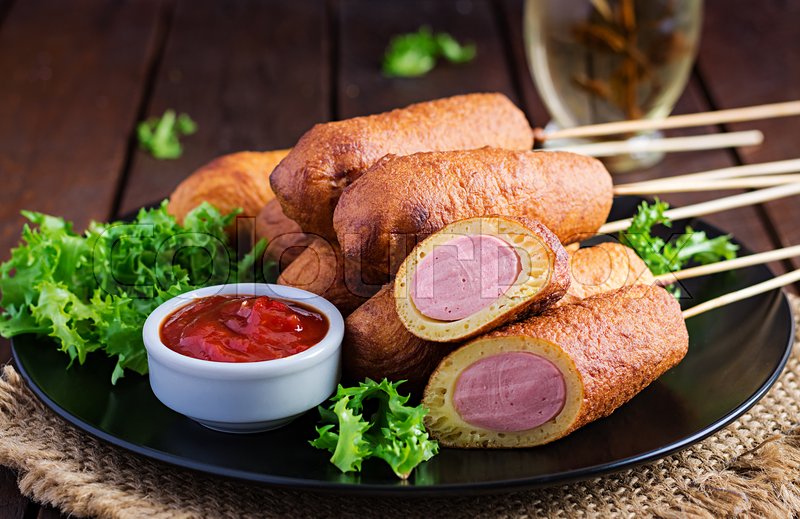 Traditional American corn dogs with ... | Stock image | Colourbox