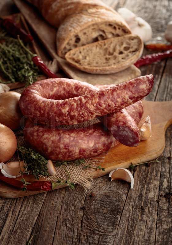 Dry-cured sausage with thyme, onion, ... | Stock image | Colourbox