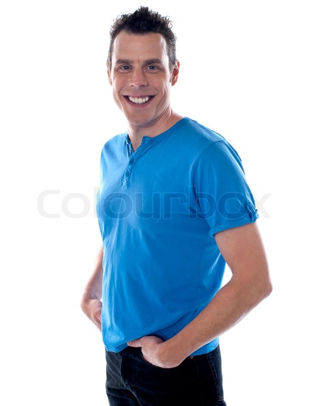 Smart fit guy posing with hands in ... | Stock image | Colourbox