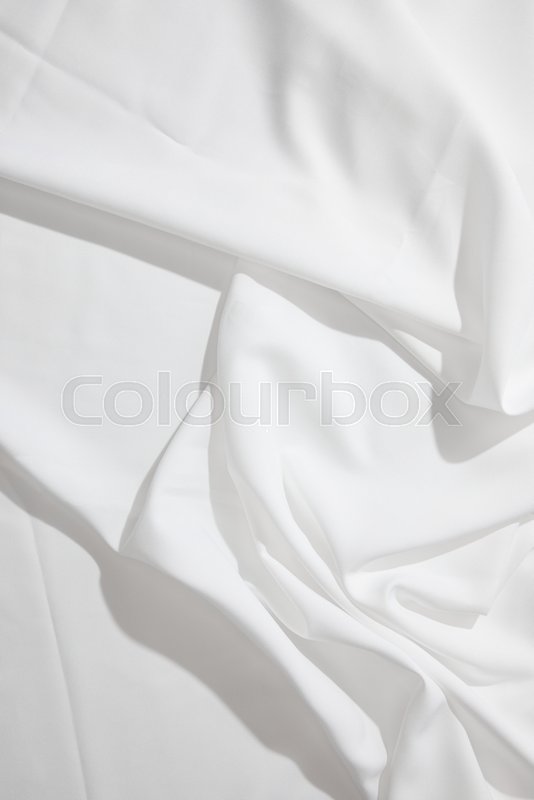 Top view of white wavy tablecloth | Stock image | Colourbox