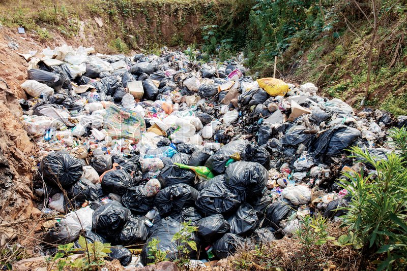 Garbage pits in the fields along the ... | Stock image | Colourbox