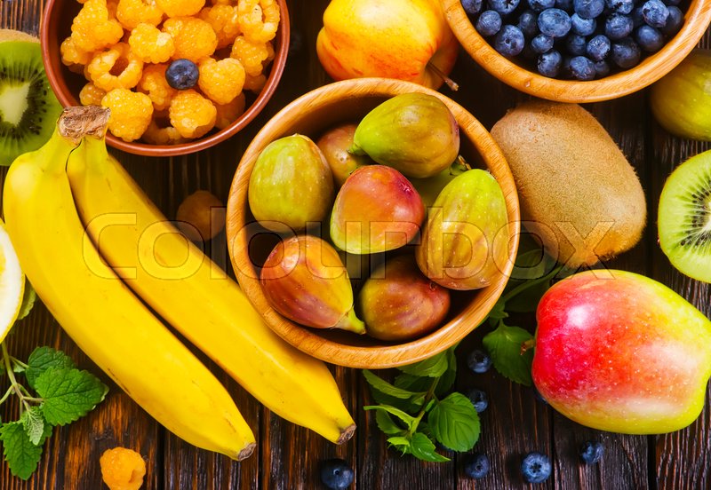 Fresh fruit on the wooden table, autumn ... | Stock image | Colourbox