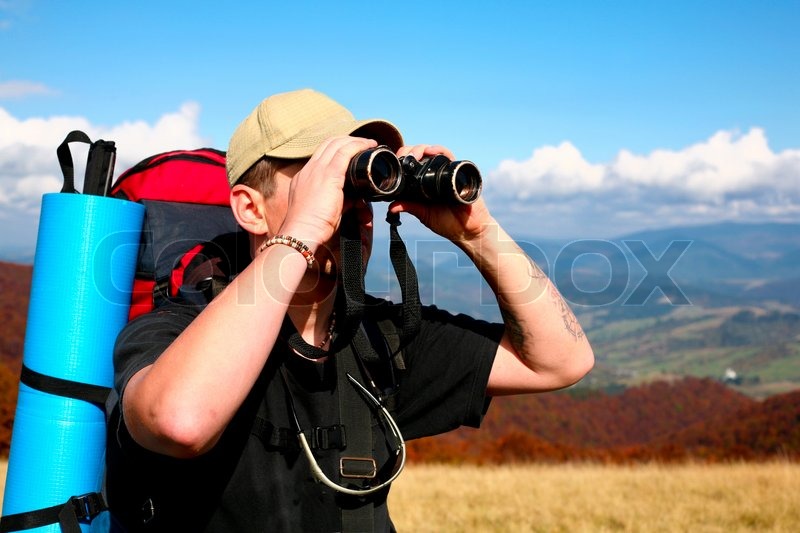 Man with binoculars | Stock image | Colourbox