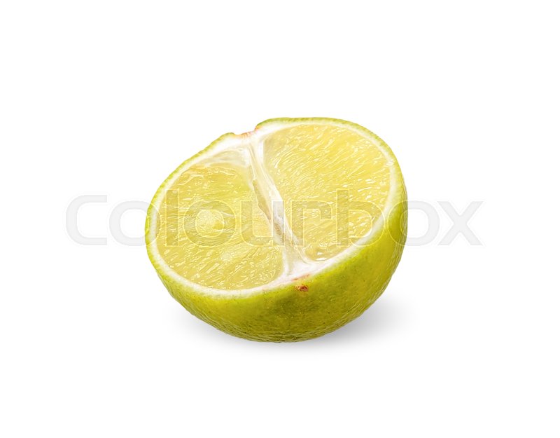 Half ripe yellow lime isolated on white ... | Stock image | Colourbox