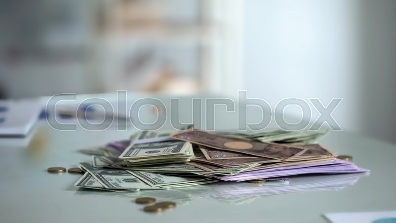 Money on table, foreign currency ... | Stock image | Colourbox