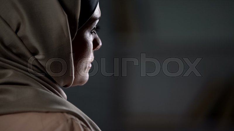 Sad muslim lady in hijab suffering from ... | Stock image | Colourbox