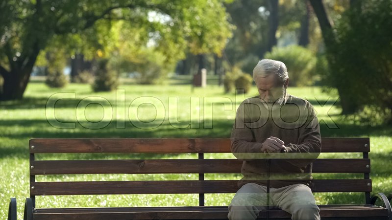 Lonely old man disappearing from bench, ... | Stock image | Colourbox