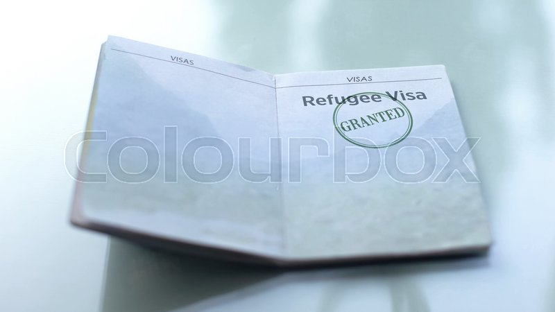 Refugee visa granted, seal stamped in ... | Stock image | Colourbox