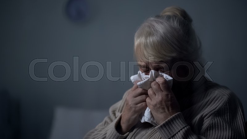 Desperate elderly female deeply crying ... | Stock image | Colourbox