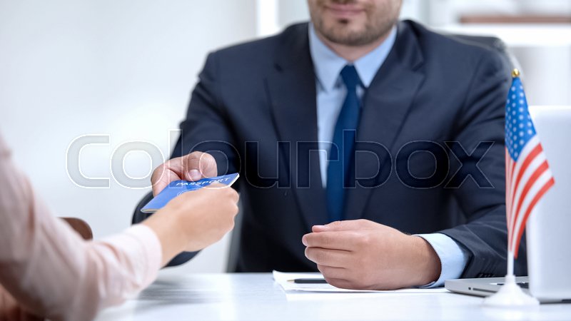 American consular officer giving ... | Stock image | Colourbox